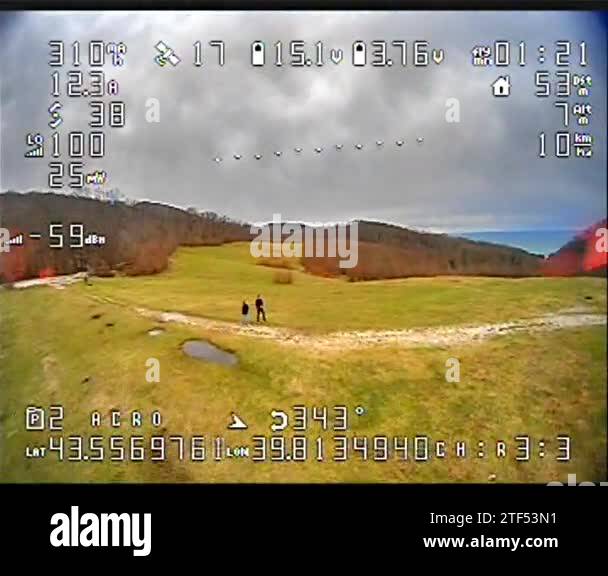 Digital crash effect on the camera from a drone with a view of green ...