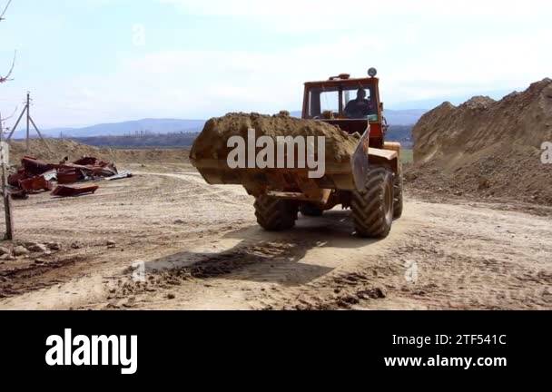 Excavator digger machine at canal construction site Stock Videos ...