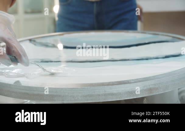 Flattening The Surface Of Epoxy Resin Art Object Using A Spatula Stock