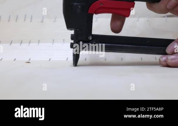 Process of connecting parts of a furniture frame using a pneumatic ...