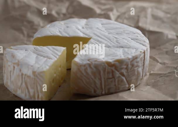 Rotating Camembert cream cheese, close-up, dairy product concept ...