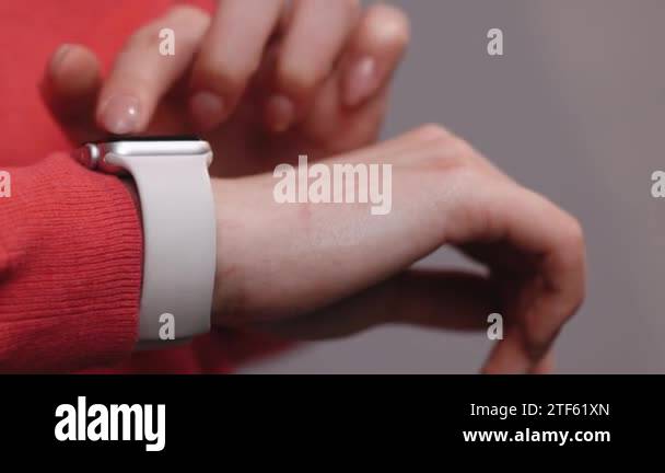 Checking the heart rate by smart watch. Smartwatch Touching screen ...