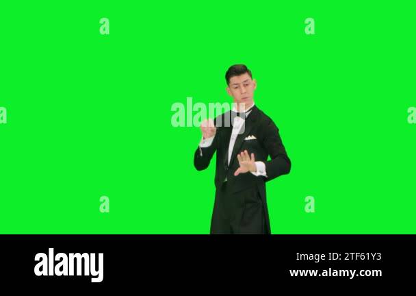 Man gracefully waves his baton to synchronize and conducting musicians ...