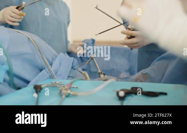 Surgery tools. The hands of an operating nurse serve a surgical ...