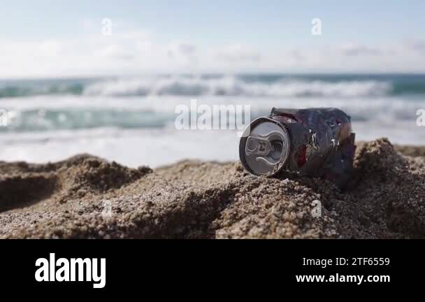 Pollution of the planet with human waste. An empty tin can thrown away ...