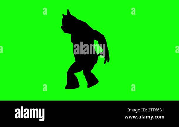 Silhouette of a fantasy creature monster beast standing idle on green ...