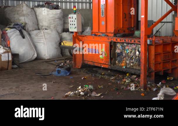 Waste compactor Stock Videos & Footage - HD and 4K Video Clips - Alamy