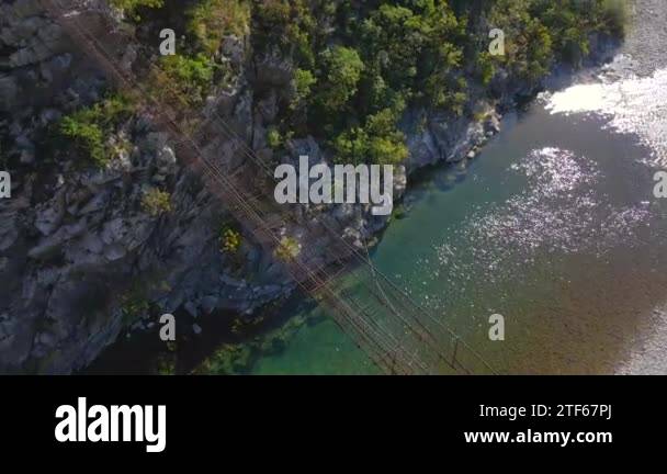Rope bridge across gorge Stock Videos & Footage - HD and 4K Video Clips ...
