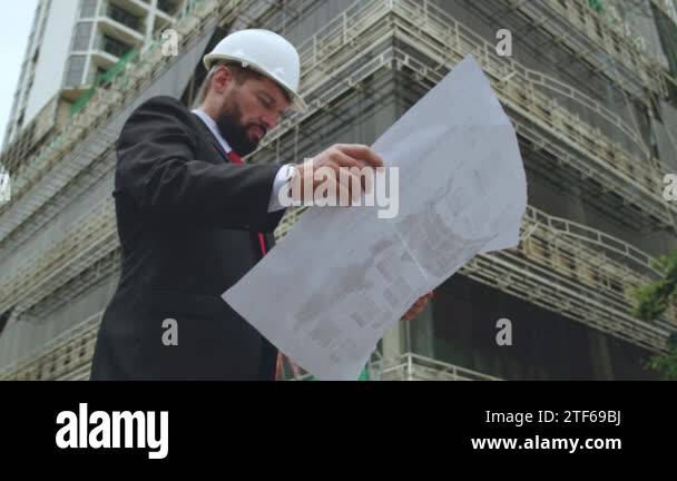 Construction site there is a civil engineer,designer, according to the drawings,checked at what ...