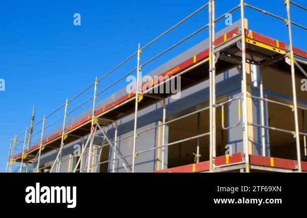 New House Constructionfoundation And Walls Of The House In Scaffoldingbuilding Materials And