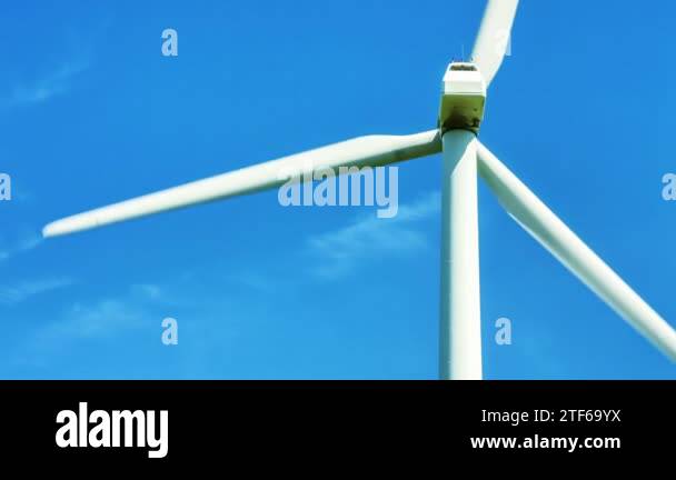 Wind turbine over blue Stock Videos & Footage - HD and 4K Video Clips ...