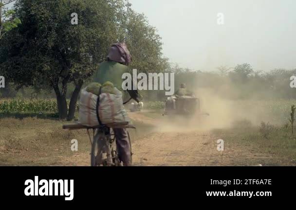 Farmer riding bike Stock Videos & Footage - HD and 4K Video Clips - Alamy