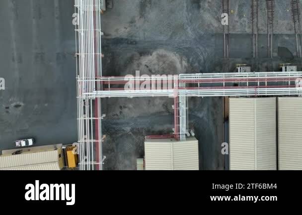 Oil and gas pipeline connects fuel storage tanks at terminal. Rising ...