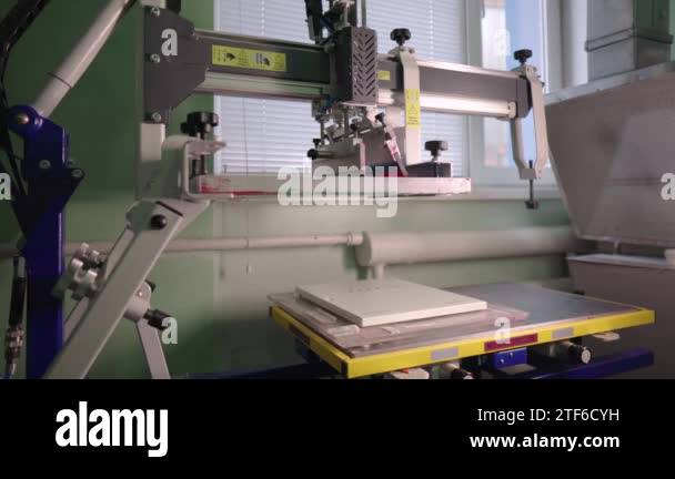 Process of making paint to devices on the factory. Applying paint logo ...