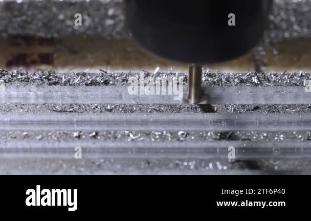 Metalworking milling machine close up. Produces metal detail in a ...