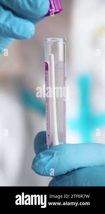 Process of coronavirus PCR antigen testing examination by nurse medic ...