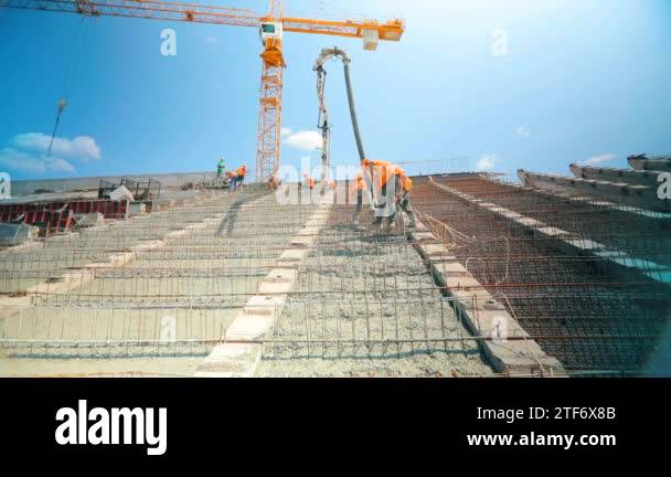 Building construction. Working process at a construction site. Builders ...