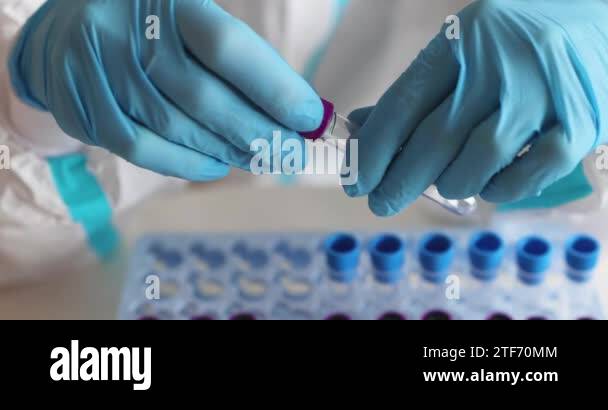 Process of coronavirus PCR antigen testing examination by nurse medic ...