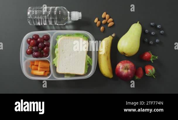 Video of healthy packed lunch of fruits and vegetables. fresh vegan ...