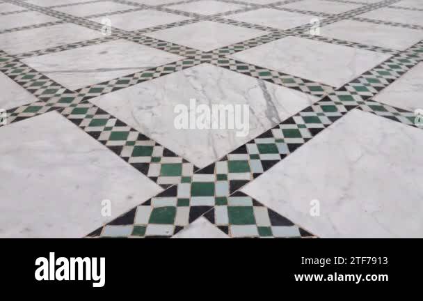 Traditional Moroccan floor with zellige mosaic tiles and marble ...