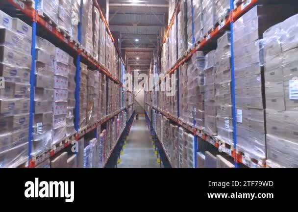 Modern forklift in a warehouse. Workflow in a modern warehouse. Large ...