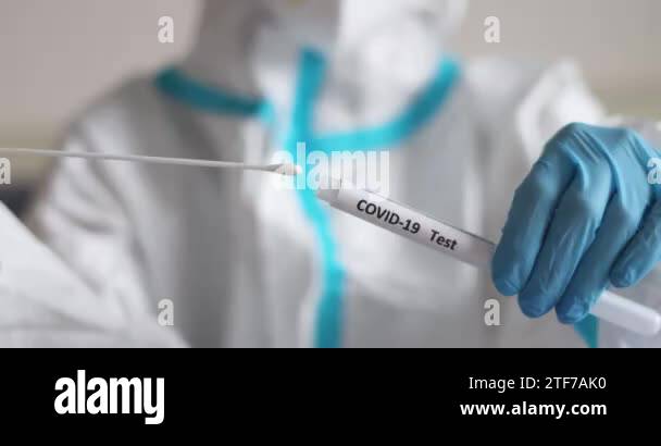 Process of coronavirus PCR antigen testing examination by nurse medic ...