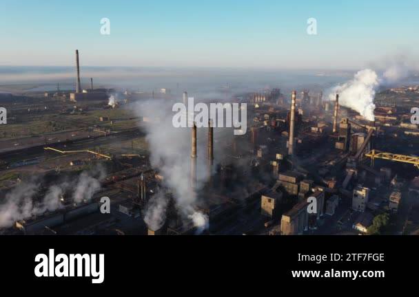 Smoke from the chimneys of a steel mill. Environmental pollution. The ...