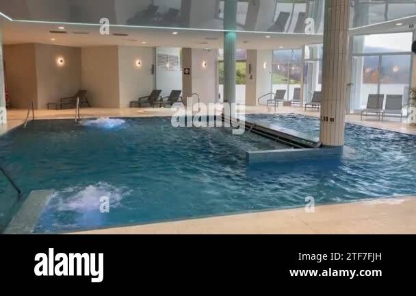 Wide shot of an empty public swimming pool. The outdoor olympic size ...