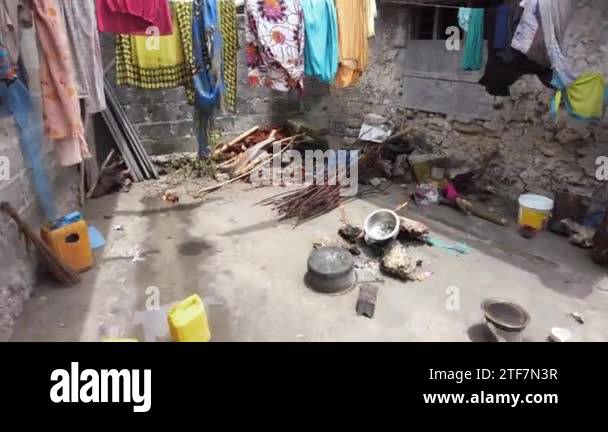 Real Life Inside an African Slum House, Clothes Drying on Clothesline ...