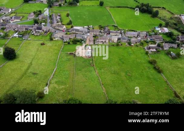 Aerial footage of the beautiful village of Thoralby in the ...