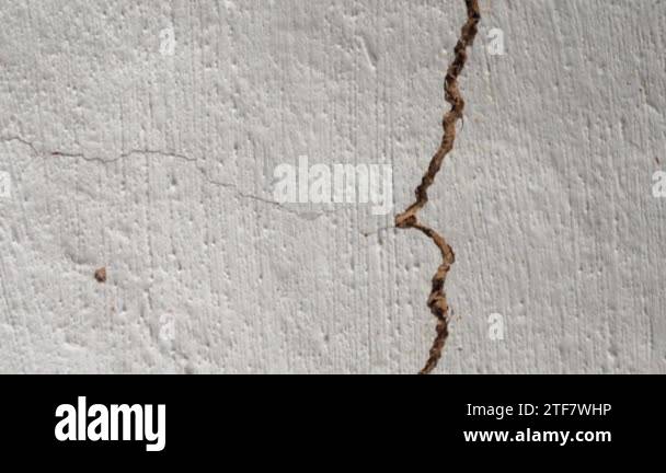 Camera movement along a crack in the ceiling. Clay ceiling of an old ...