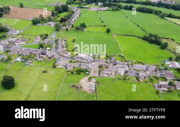 Aerial footage of the beautiful village of Thoralby in the ...