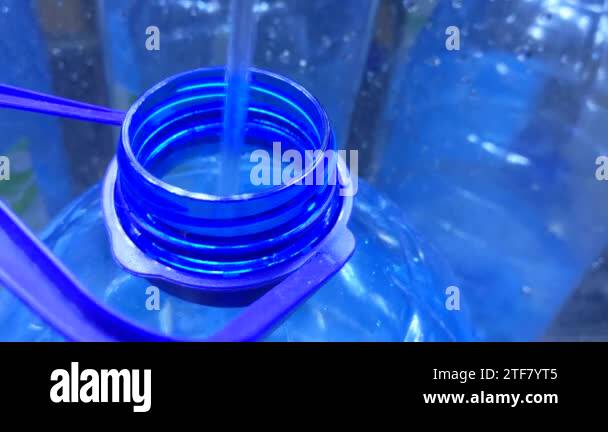 Filling bottle water Stock Videos & Footage - HD and 4K Video Clips - Alamy