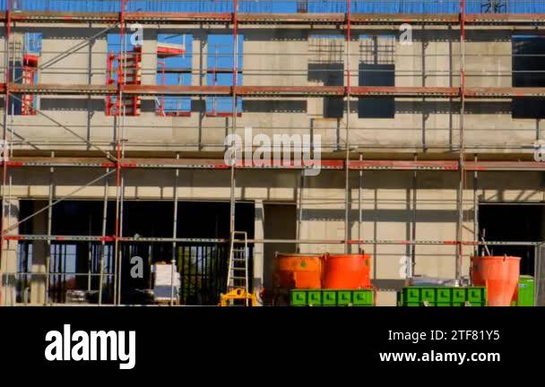 Construction.Foundation and walls of the house in scaffolding.Building ...