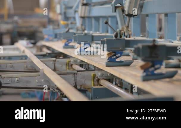 Furniture board production process. Automated conveyor belt at a ...