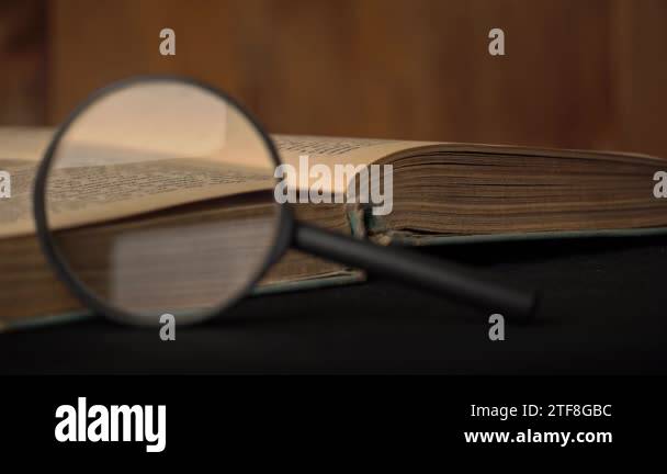 Book magnifying glass background Stock Videos & Footage - HD and 4K ...