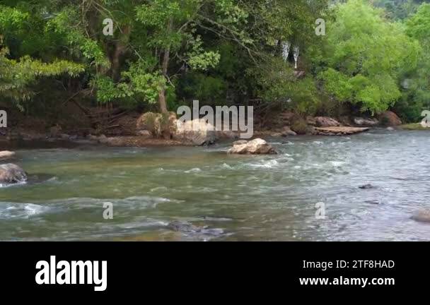 Beautiful moving stream through the rock from Mae Taeng River is a ...
