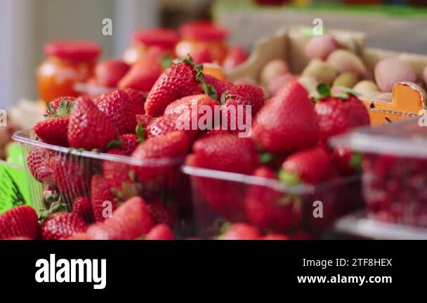 Closeup to the camera in the farming shop taking video of a fresh ...