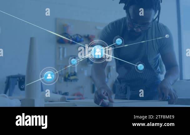 Animation of network of connections with icons over african american ...