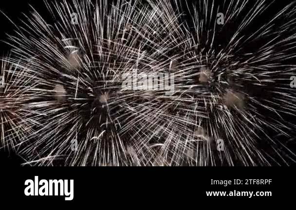 4K. loop seamless of real fireworks background. abstract blur of real ...