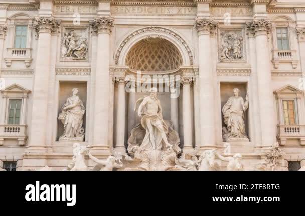 Trevi Fountain with white statues built in center of Rome. Pompous ...