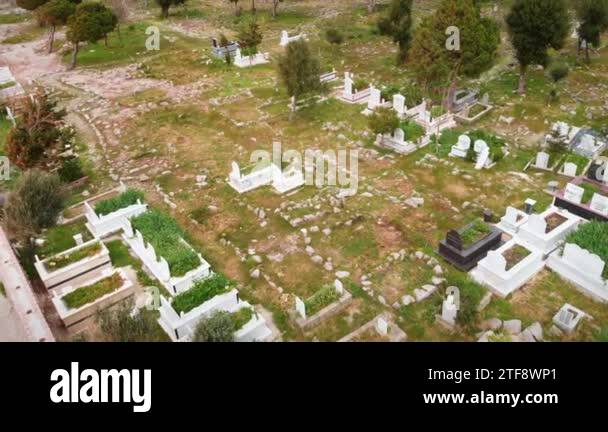 Old Muslim cemetery with white tombstones and grave headstones. Islamic ...