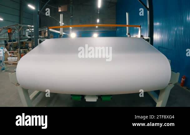 Production of agrofibre at the factory. Agrofibre on the conveyor line ...