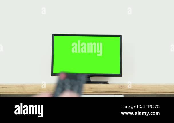 Watching chroma key TV and changing channel by remote control. Channel ...