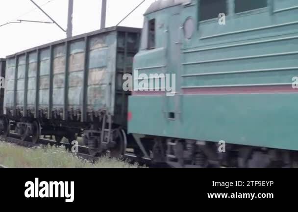 Railway station and railway station. Goods old freight train arrived at the railway station. A ...