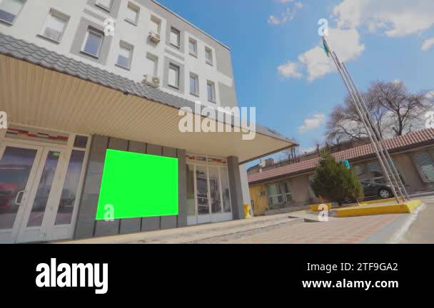 Office building with green screen. advertising banner green screen. An ...