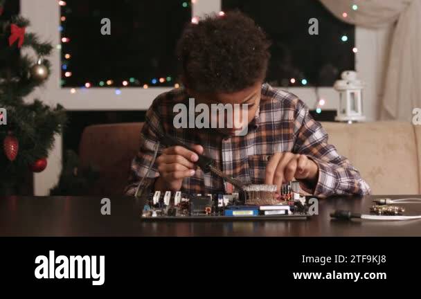 Boy fixing Stock Videos & Footage - HD and 4K Video Clips - Alamy