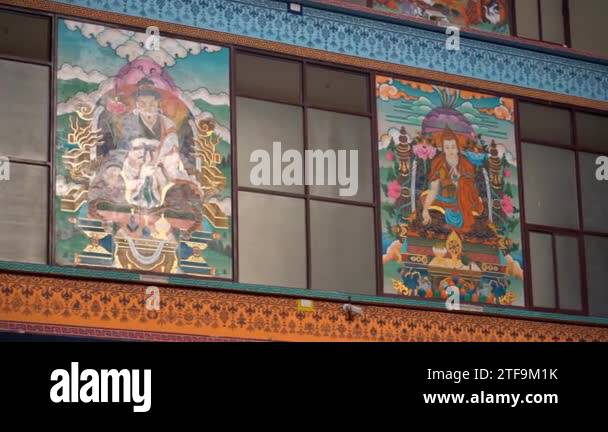 Wall paintings of different spiritual icons in a Buddhist monastery ...