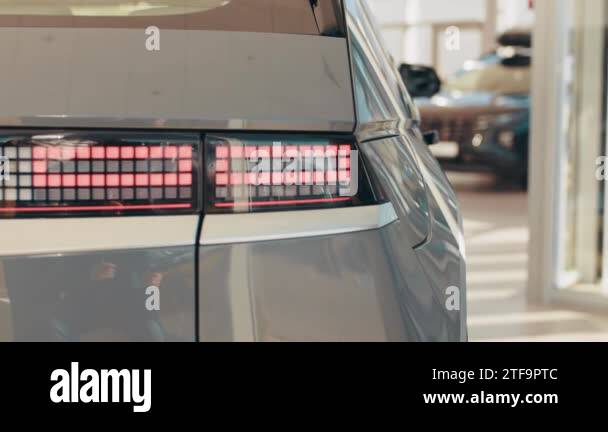 Start of a refueling process of an electric car. A shot under the hatch ...