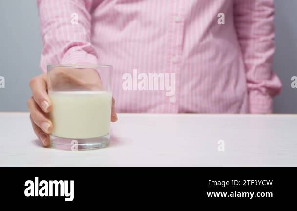 Lactose intolerance concept. Pain in abdomen after drinking milk Stock ...